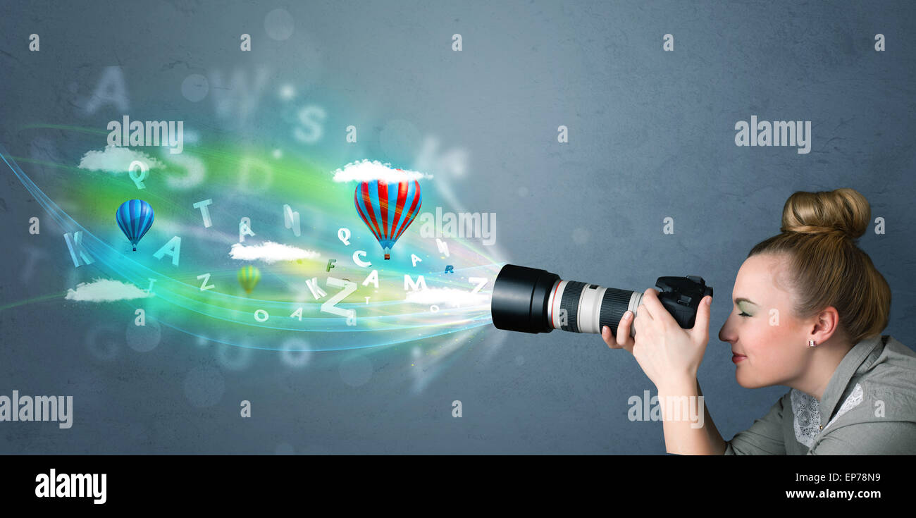 Photographer with camera and abstract imaginary Stock Photo - Alamy