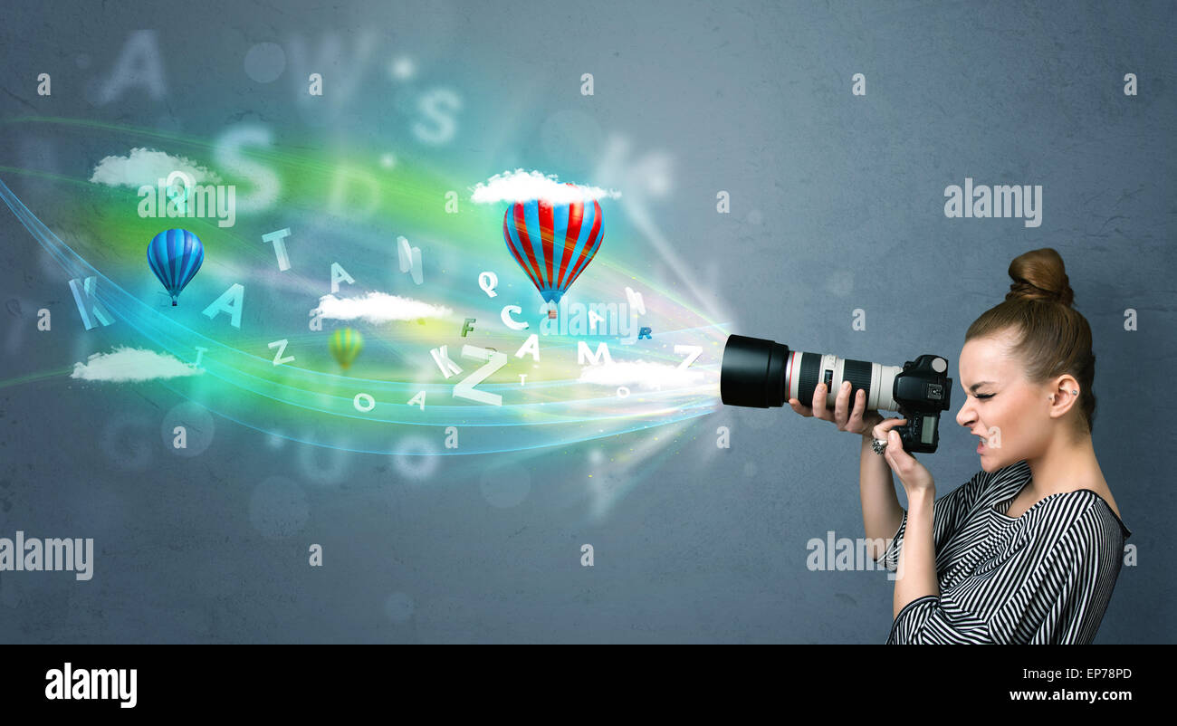 Photographer with camera and abstract imaginary Stock Photo - Alamy
