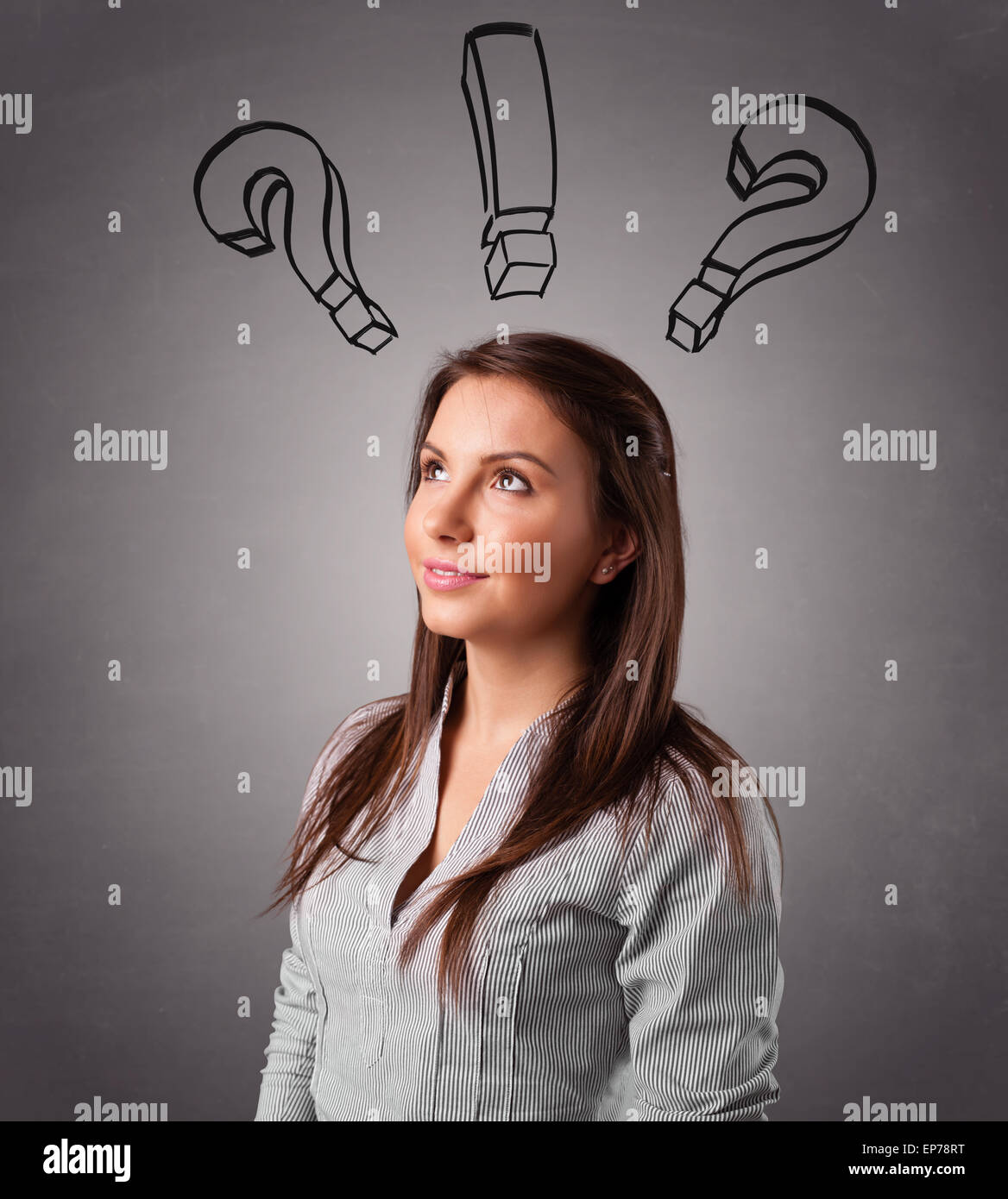Young lady thinking with question marks overhead Stock Photo - Alamy