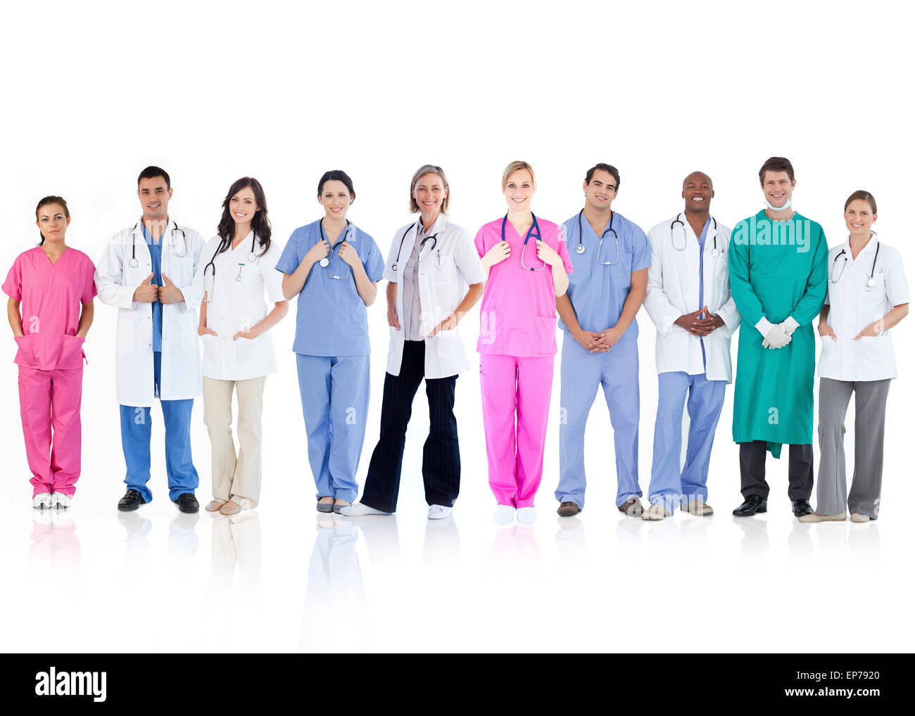 Happy team of doctors standing together in a line Stock Photo - Alamy