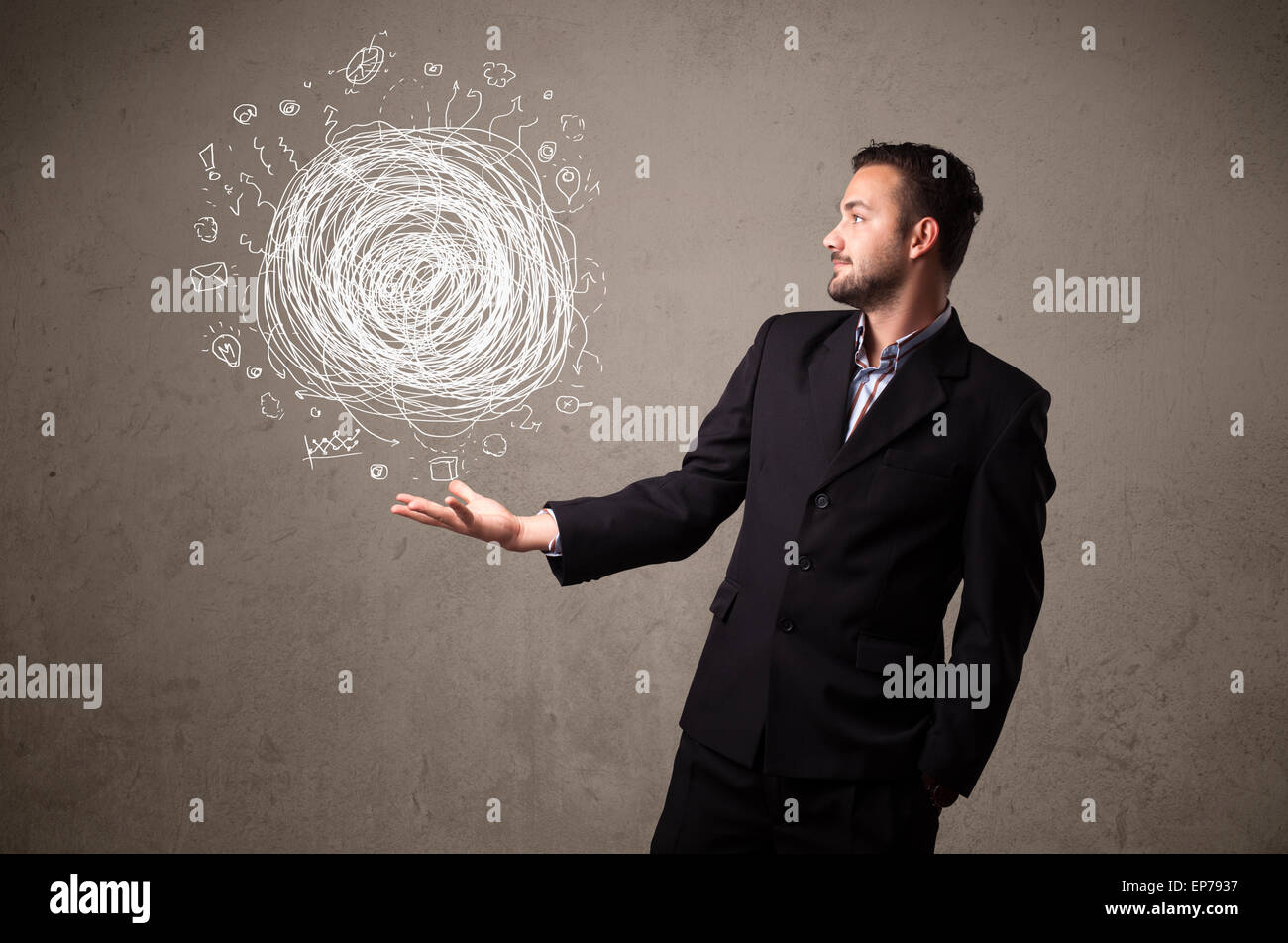 Chaos concept in the hand of a businessman Stock Photo - Alamy