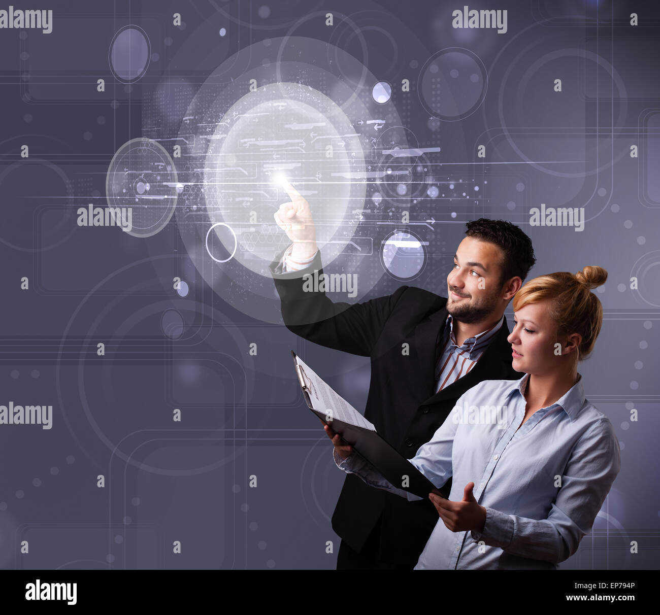 Couple press virtual screen button hi-res stock photography and images ...