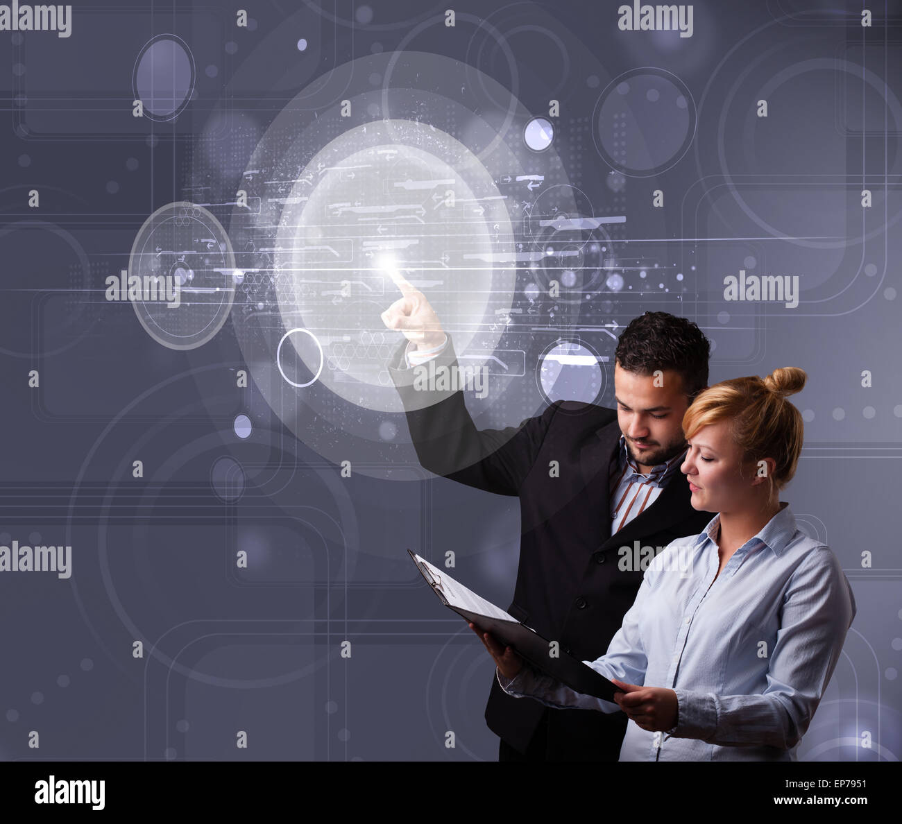 Happy couple touching abstract high technology circular buttons Stock ...