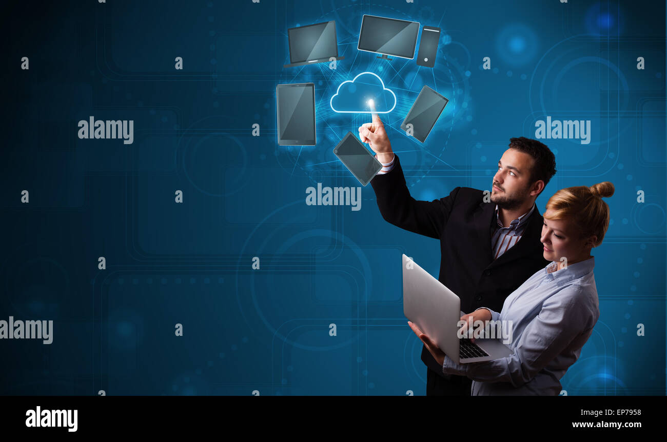 Happy couple touching cloud service Stock Photo - Alamy