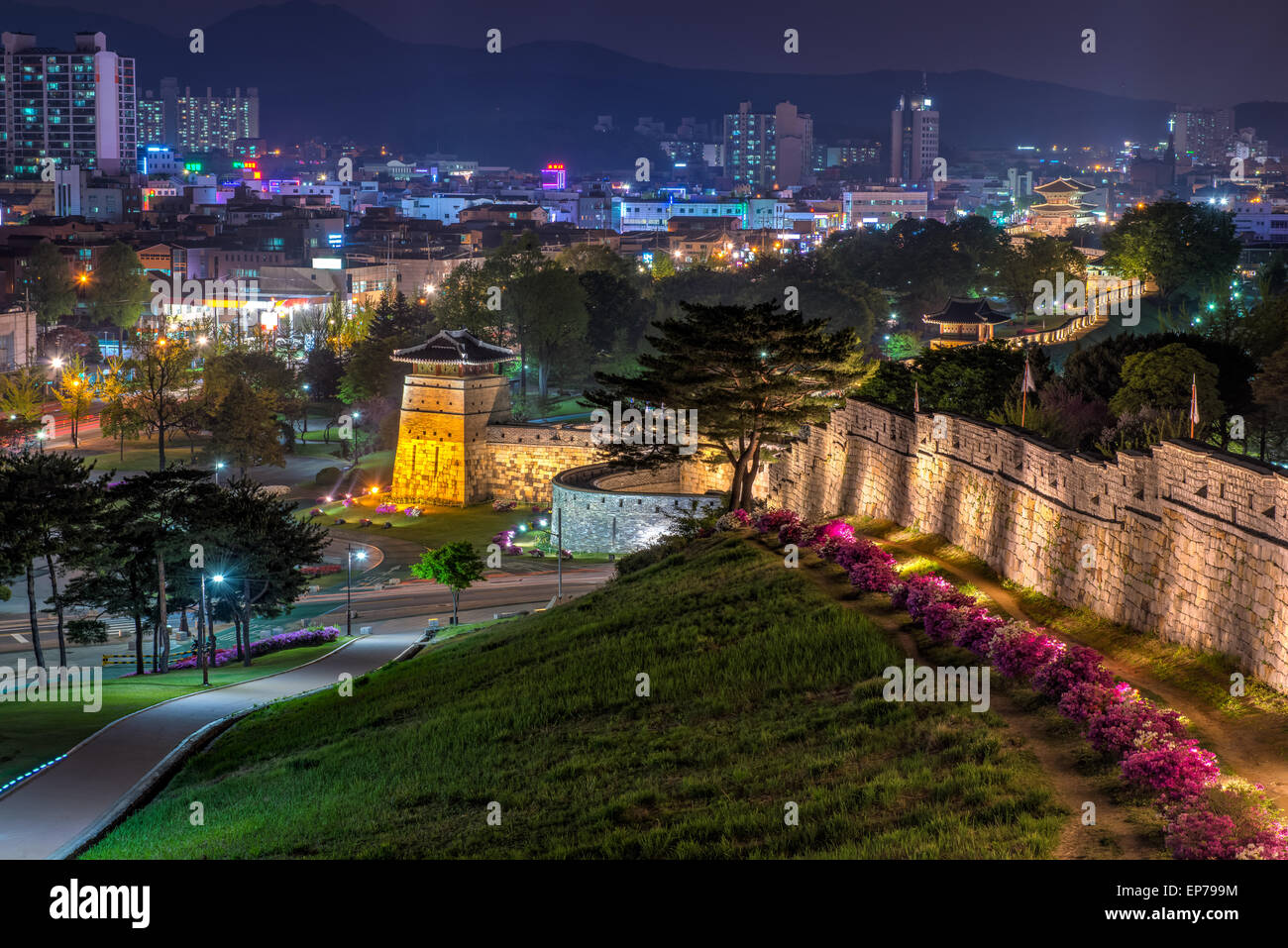 The old walls of Hwaseong Fortress lit up at night in Suwon, South ...
