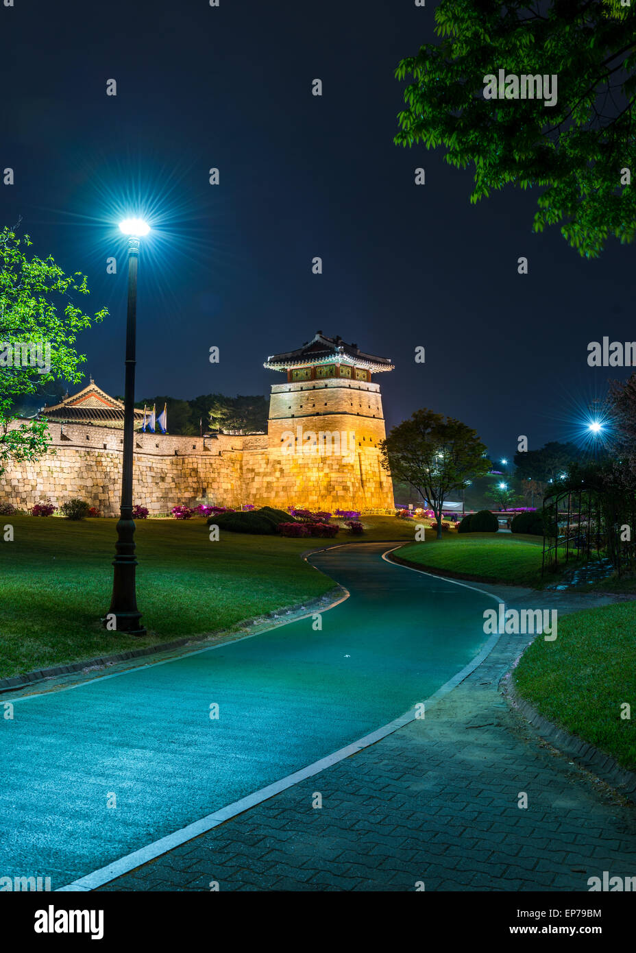 The old walls of Hwaseong Fortress lit up at night in Suwon, South ...