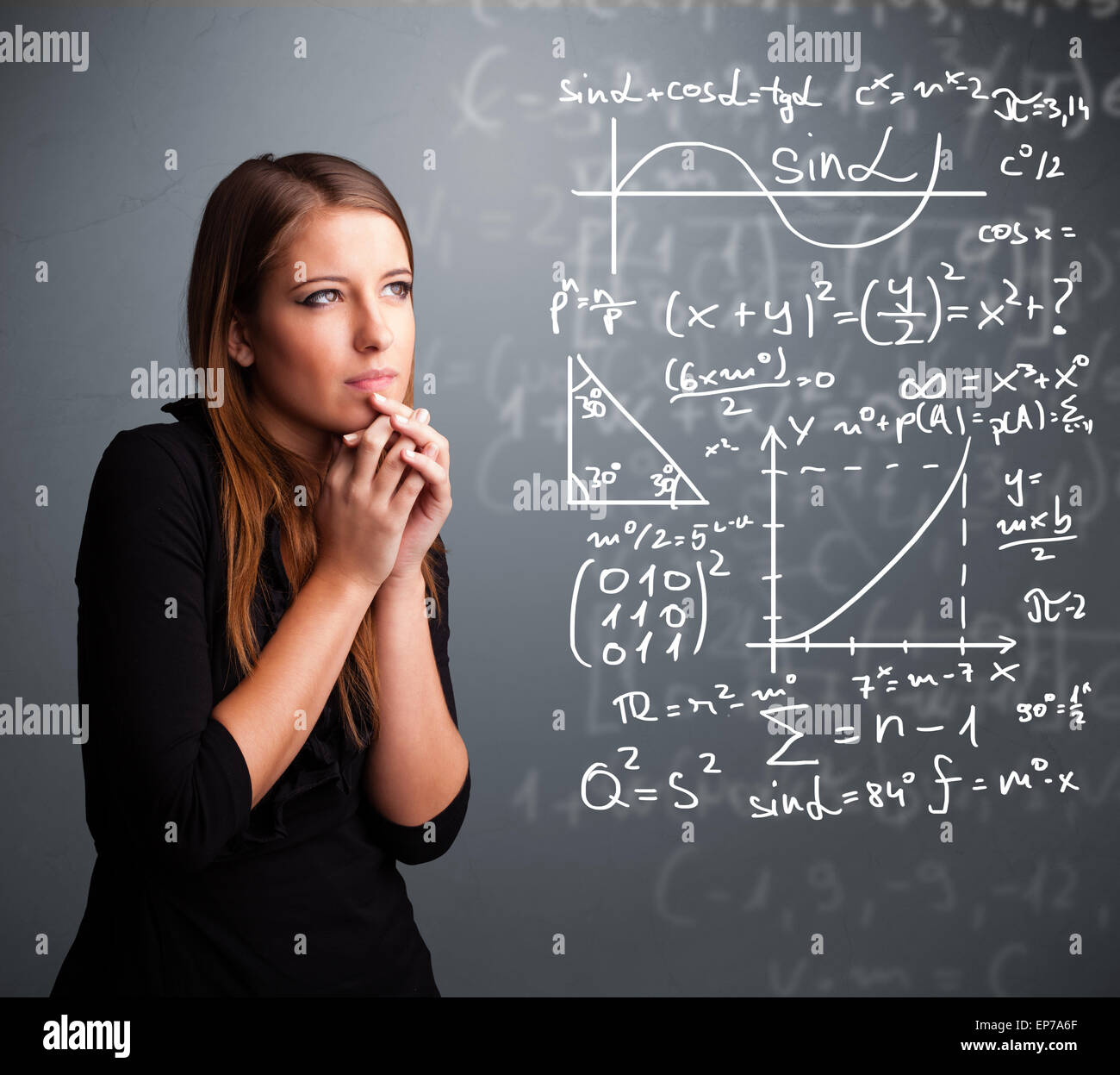 Beautiful school girl thinking about complex mathematical signs Stock ...