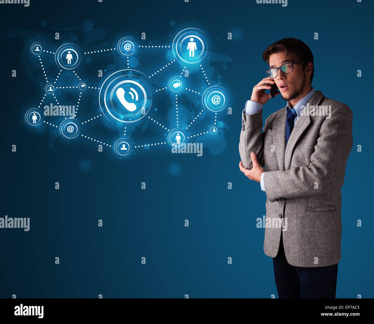 Young boy making phone call with social network icons Stock Photo - Alamy