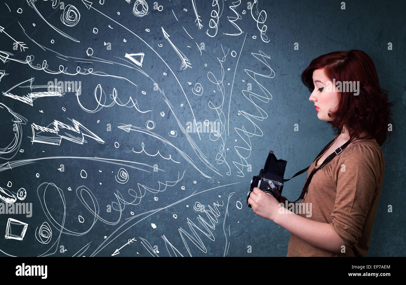 Photographer shooting images while energetic hand drawn lines and ...