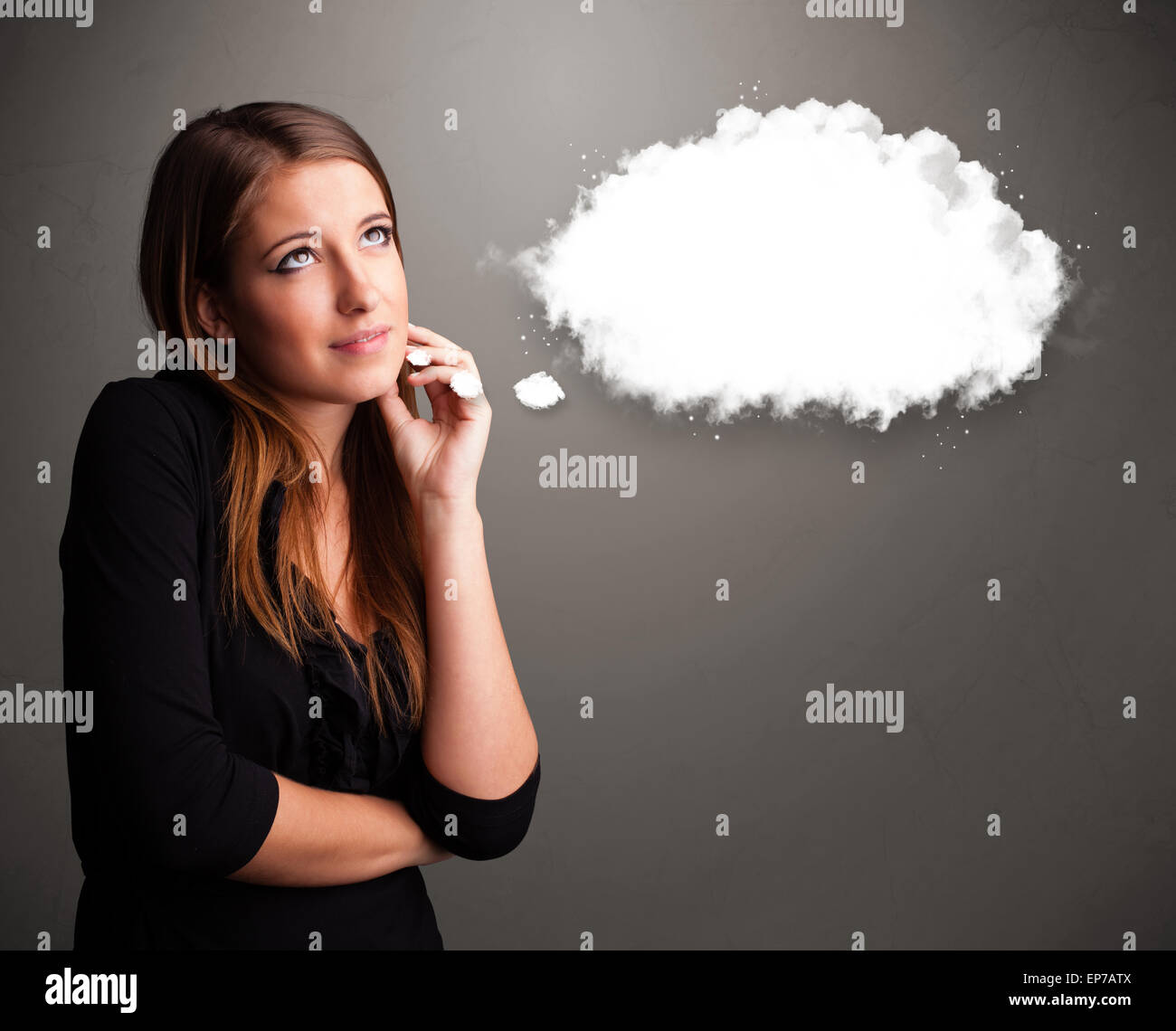 Pretty lady thinking about cloud speech or thought bubble with copy space Stock Photo - Alamy