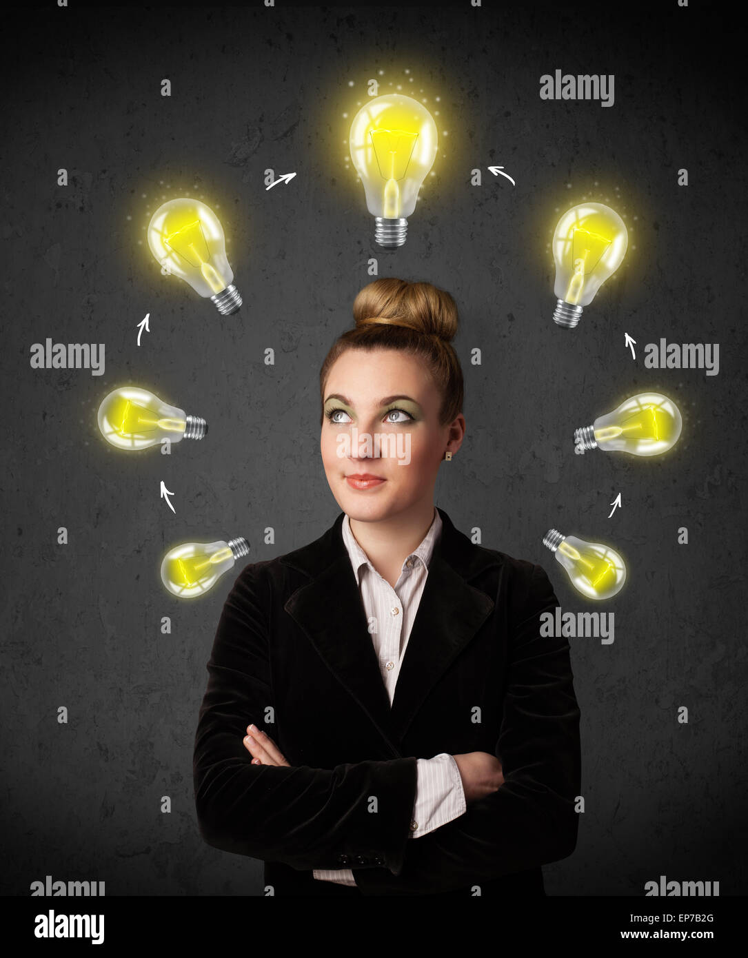 Young woman thinking with lightbulb circulation around her head Stock ...