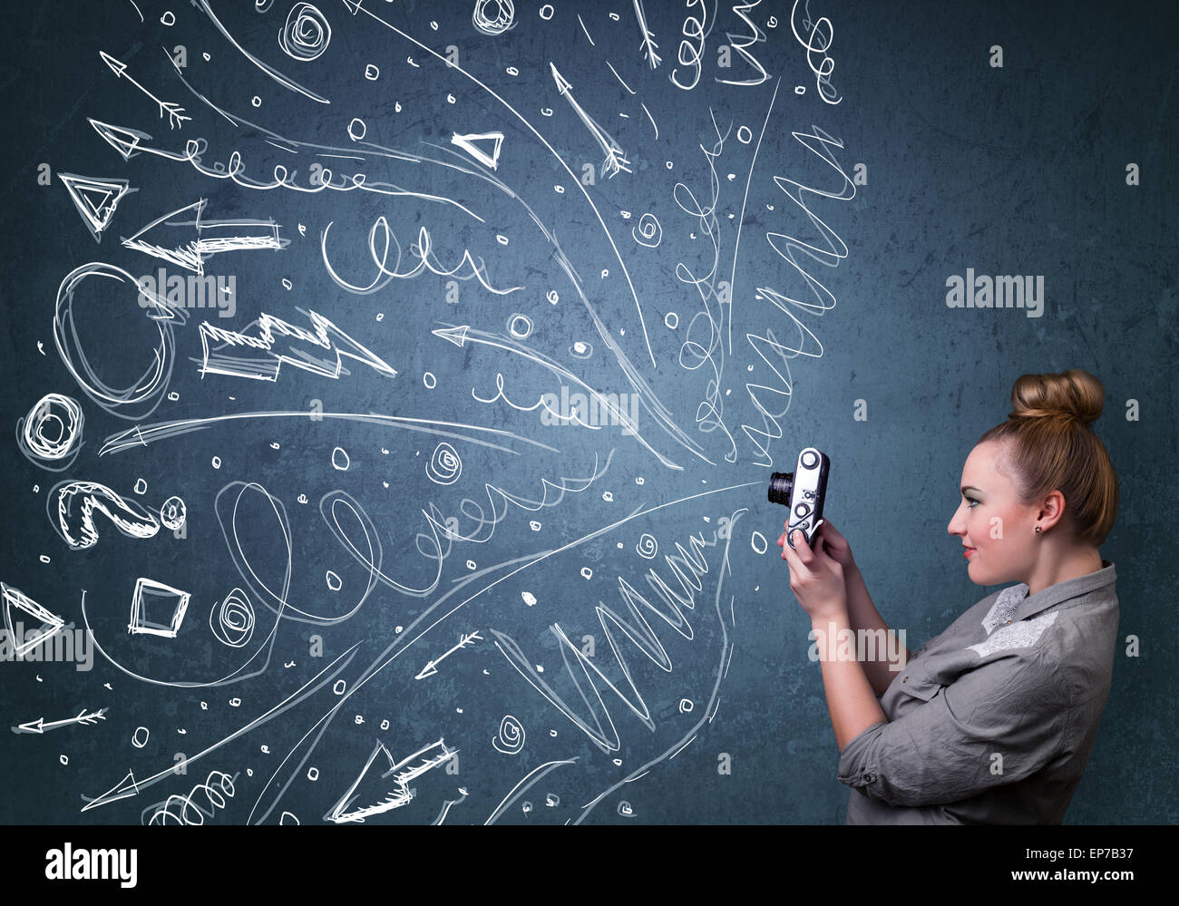 Photographer shooting images while energetic hand drawn lines and ...