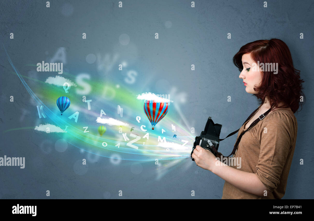 Photographer with camera and abstract imaginary Stock Photo - Alamy