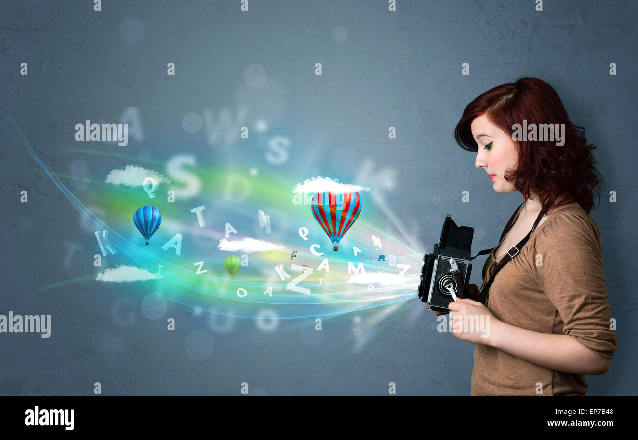 Photographer with camera and abstract imaginary Stock Photo - Alamy