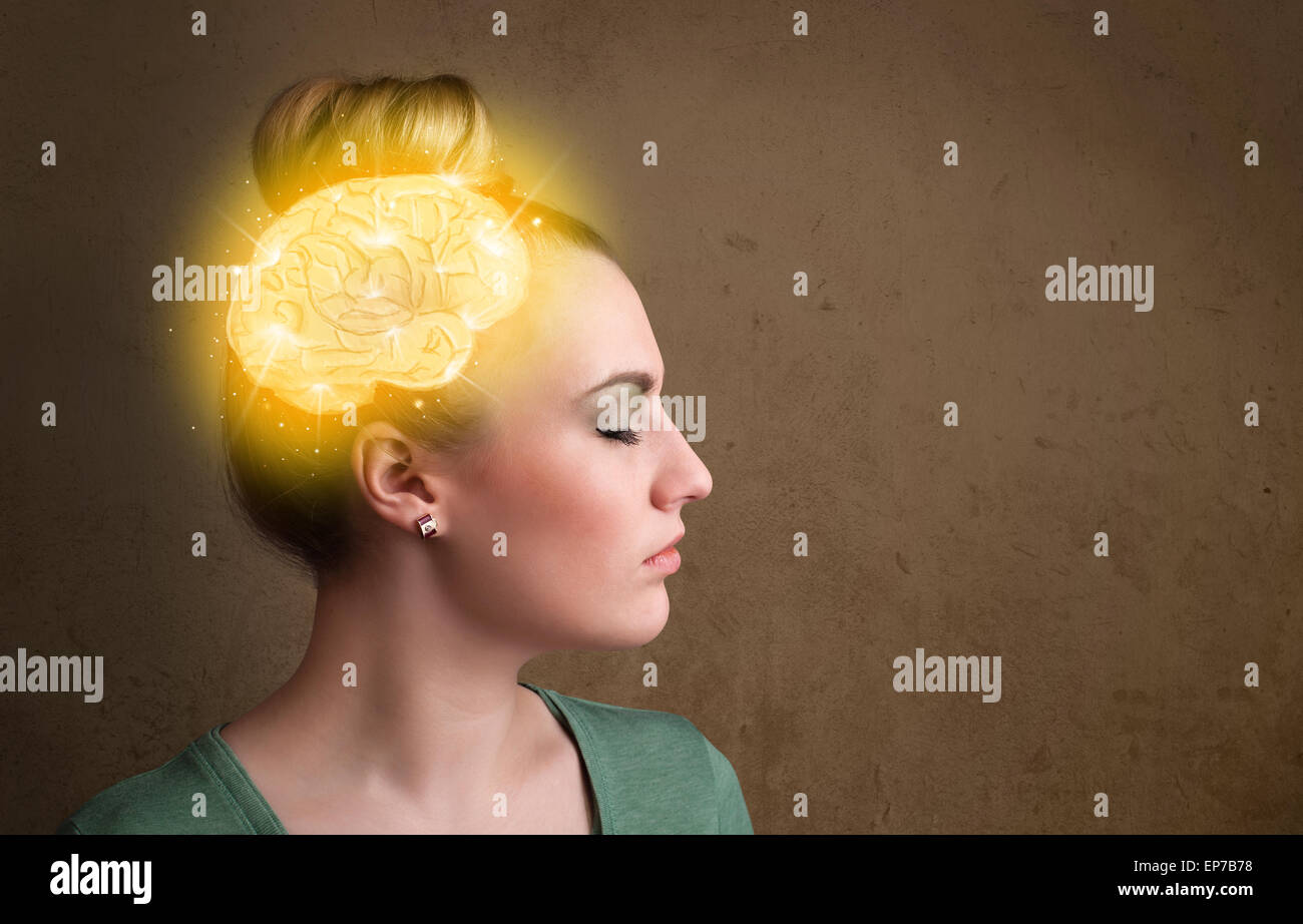 Young girl thinking with glowing brain illustration Stock Photo - Alamy