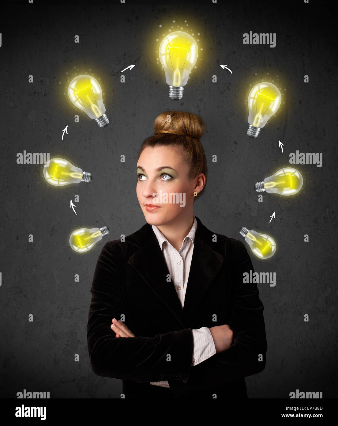 Young woman thinking with lightbulb circulation around her head Stock ...