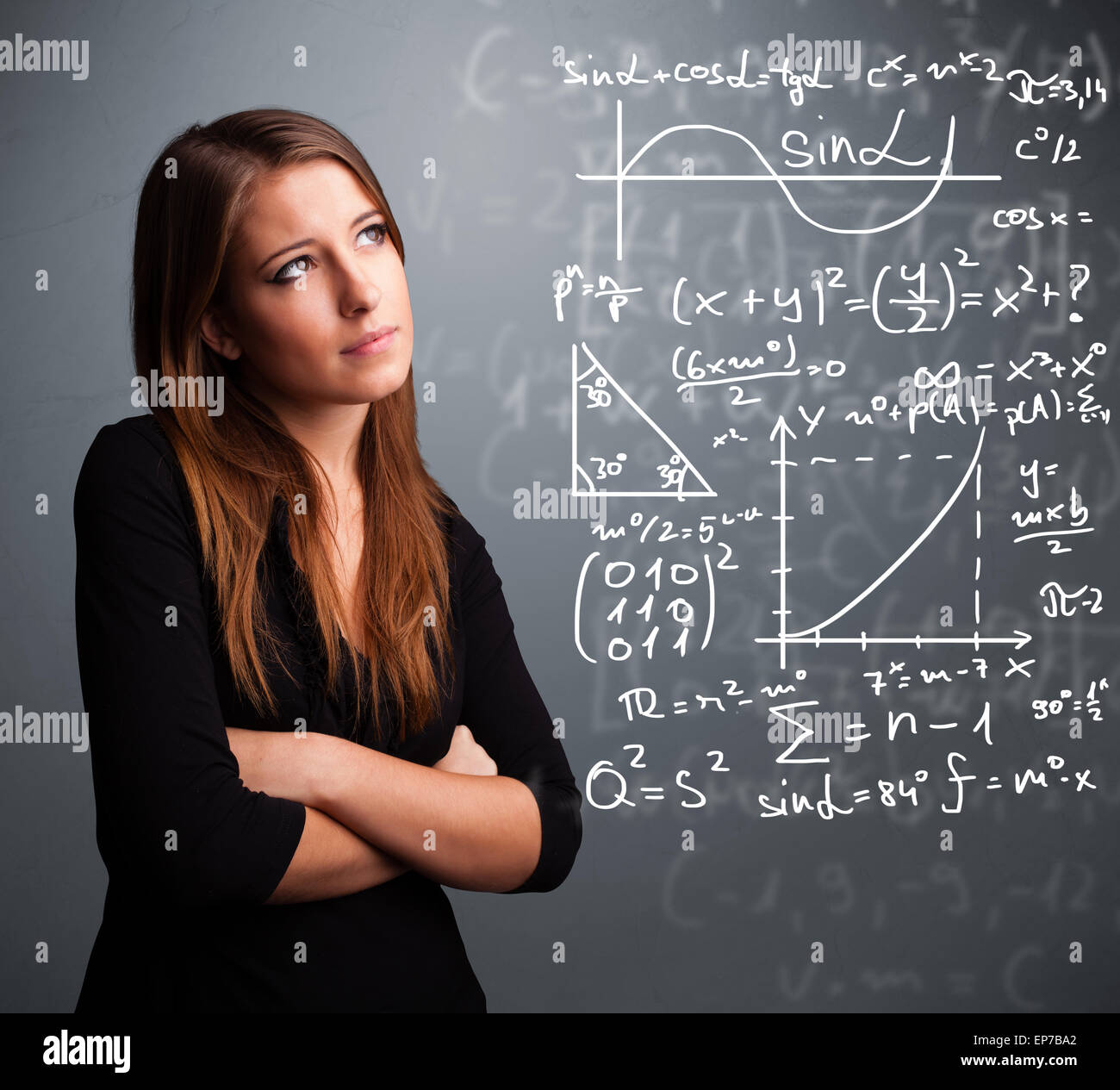 Beautiful school girl thinking about complex mathematical signs Stock ...