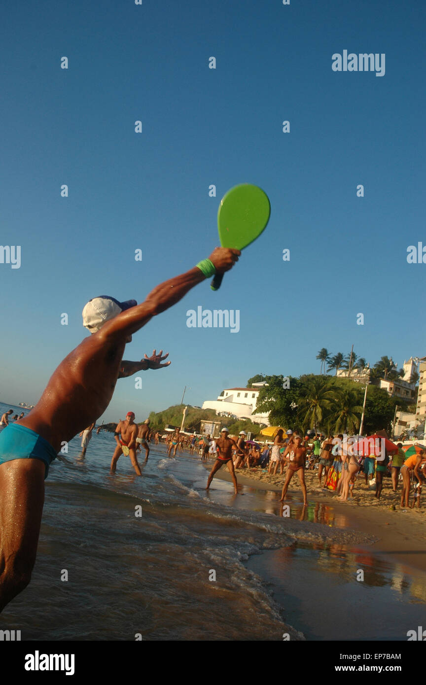 Salvador de Bahia, Brazil: men playing frescobol at Praia da Barra ...