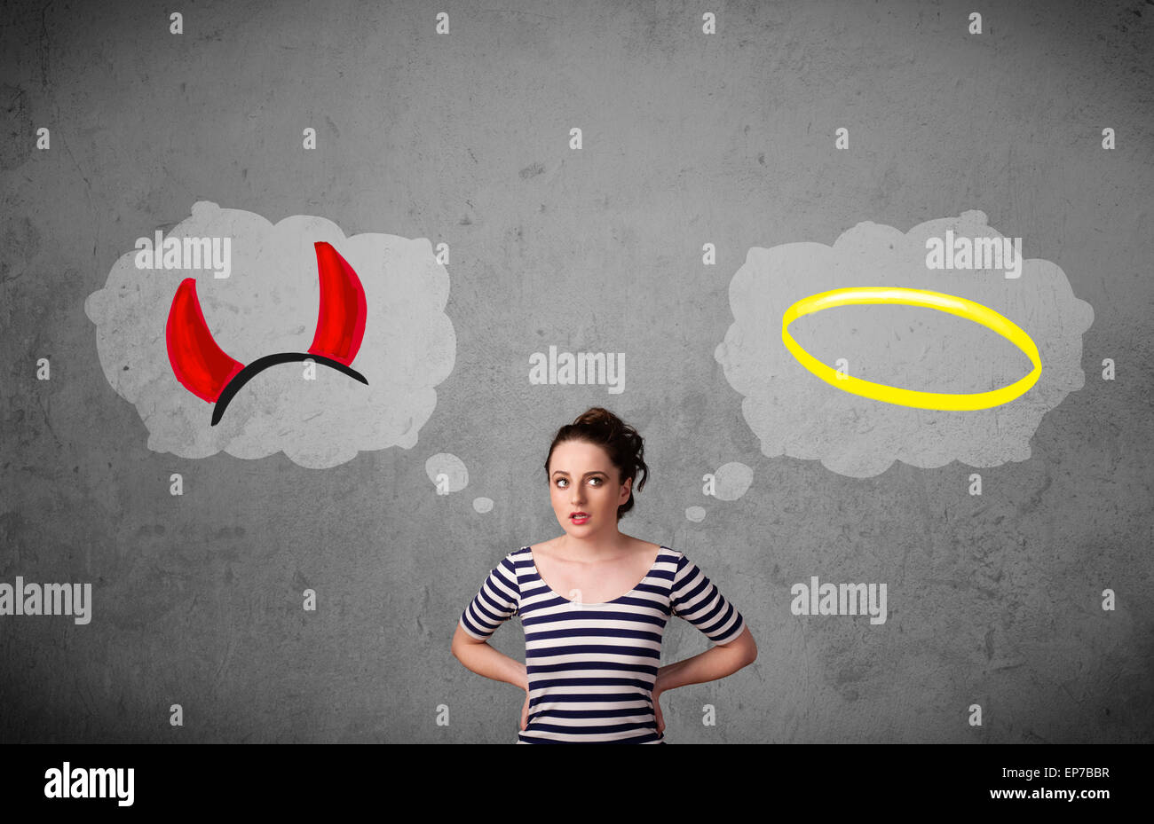 Woman choosing between good and bad Stock Photo - Alamy