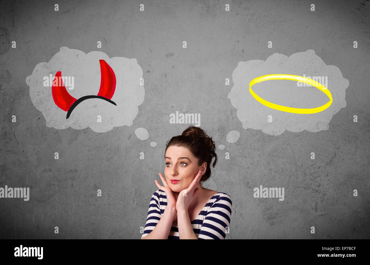 Woman choosing between good and bad Stock Photo - Alamy