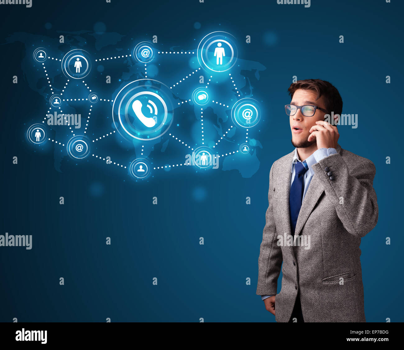 Young boy making phone call with social network icons Stock Photo - Alamy