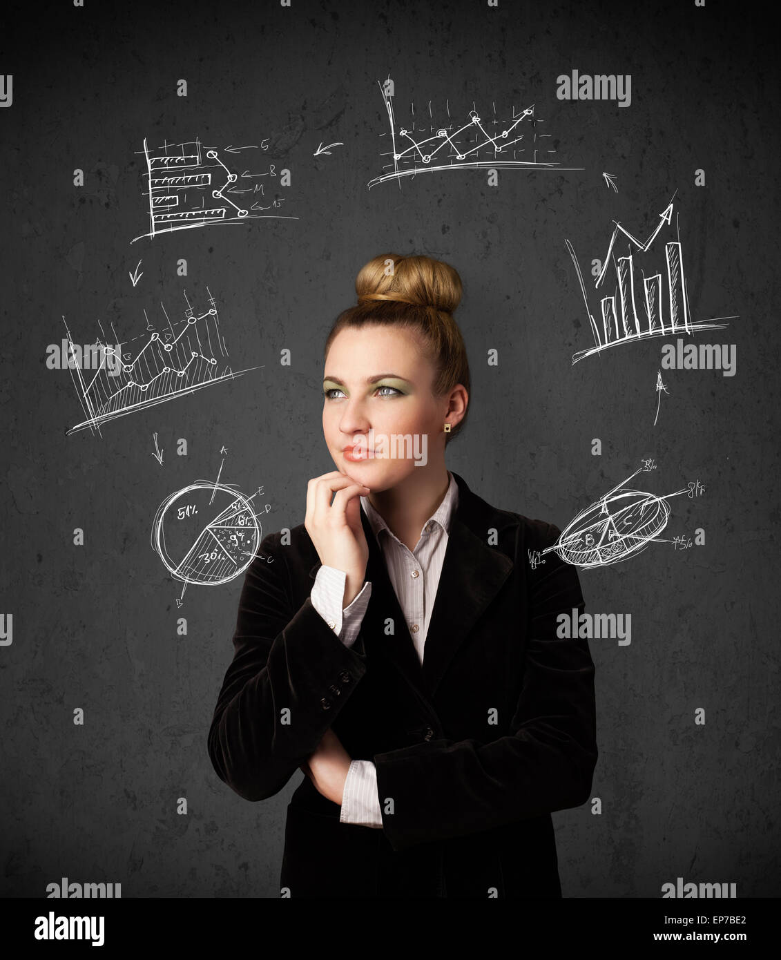 Young woman thinking with charts circulation around her head Stock ...