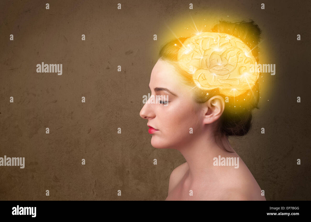 Young girl thinking with glowing brain illustration Stock Photo - Alamy