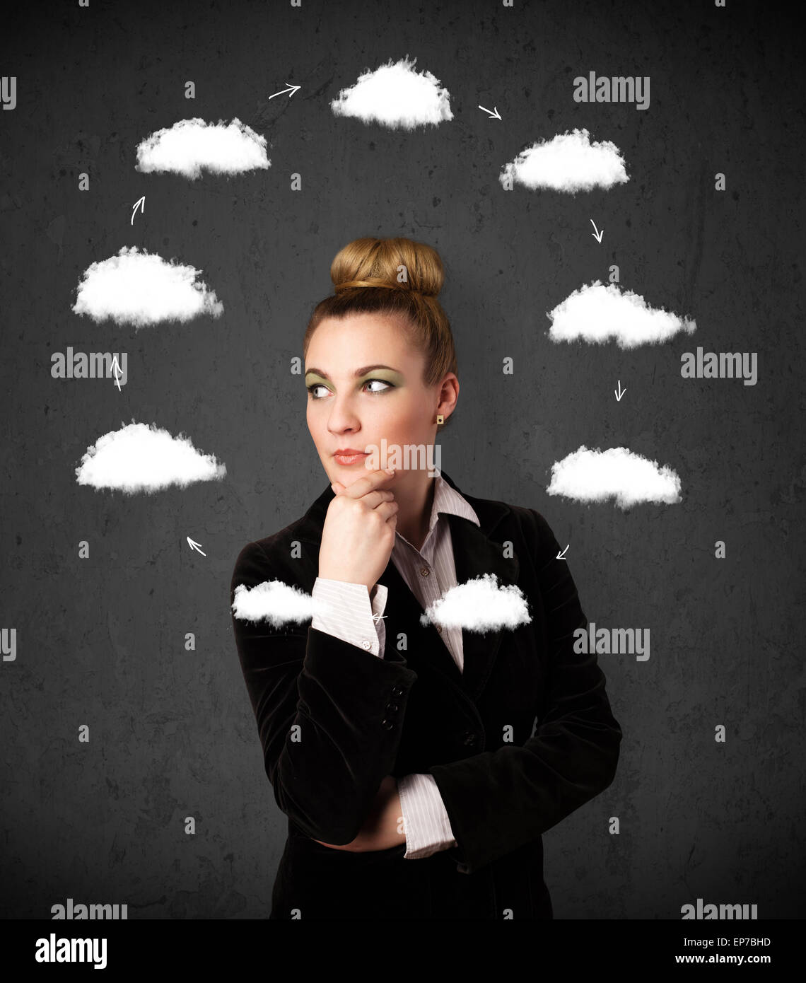 Young woman thinking with cloud circulation around her head Stock Photo ...