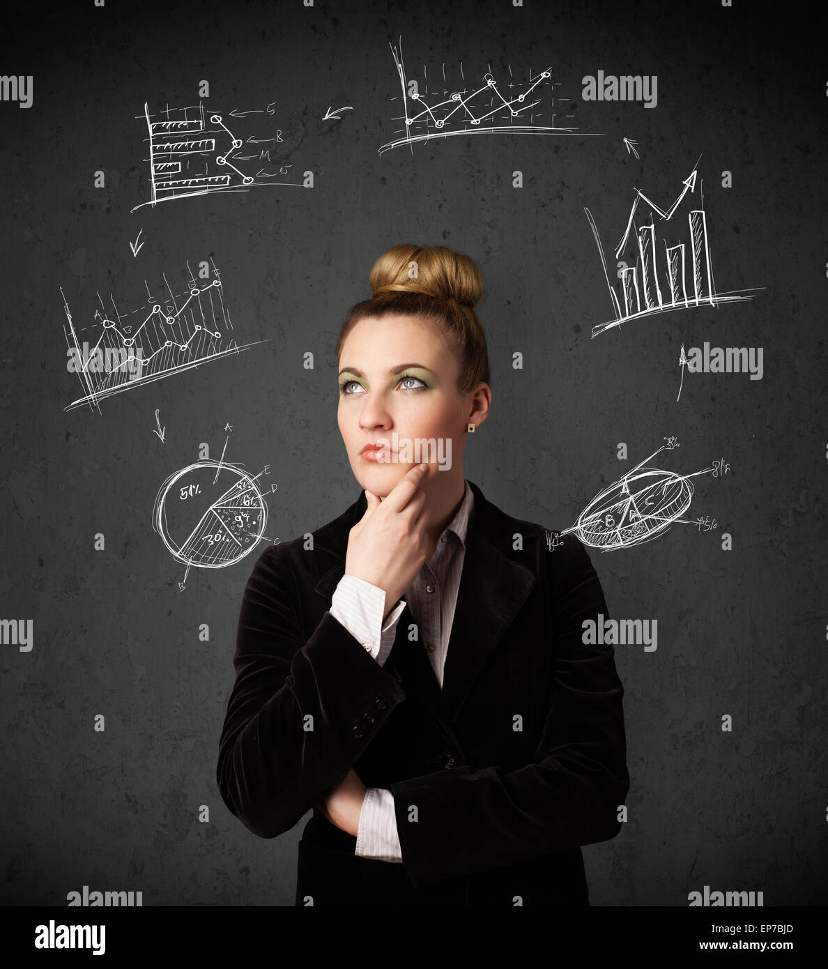 Young woman thinking with charts circulation around her head Stock ...