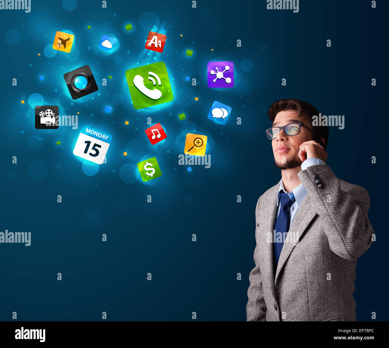 Young man calling by phone with various icons Stock Photo - Alamy