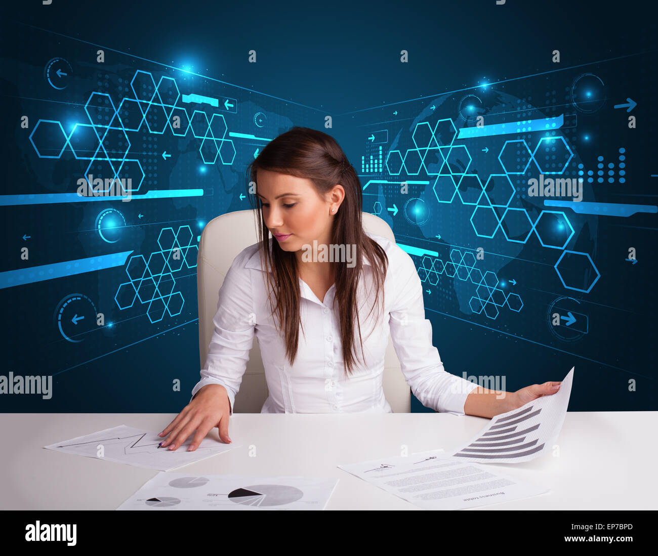 Businesswoman doing paperwork with futuristic background Stock Photo ...