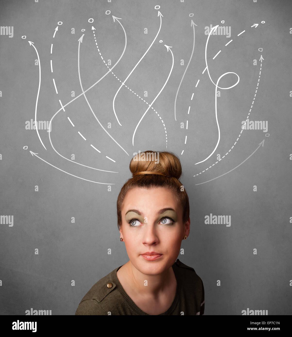 Young woman with arrows coming out of her head Stock Photo - Alamy