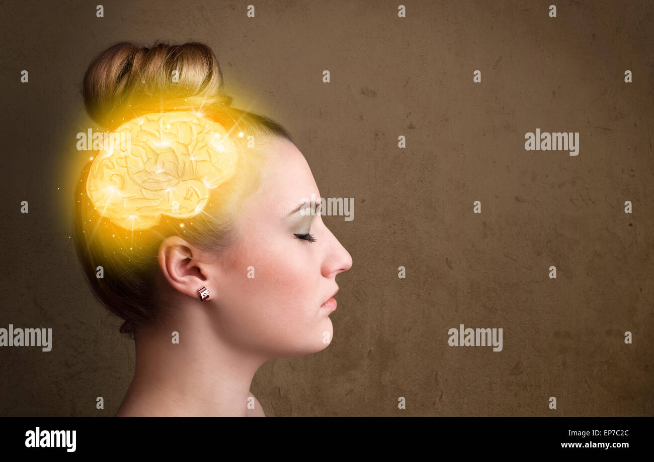 Young girl thinking with glowing brain illustration Stock Photo - Alamy
