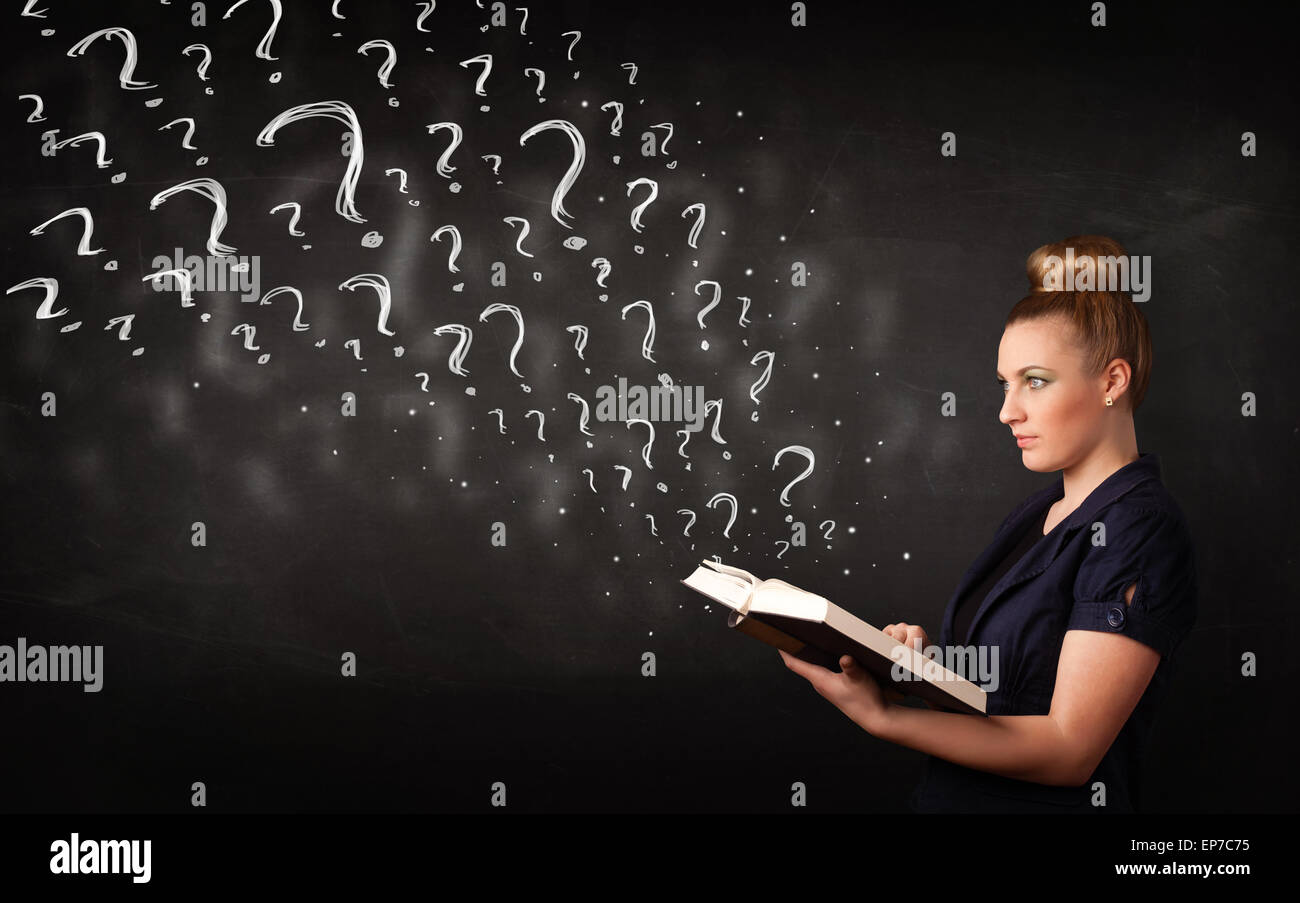 Pretty woman reading a book with question marks coming out from it ...