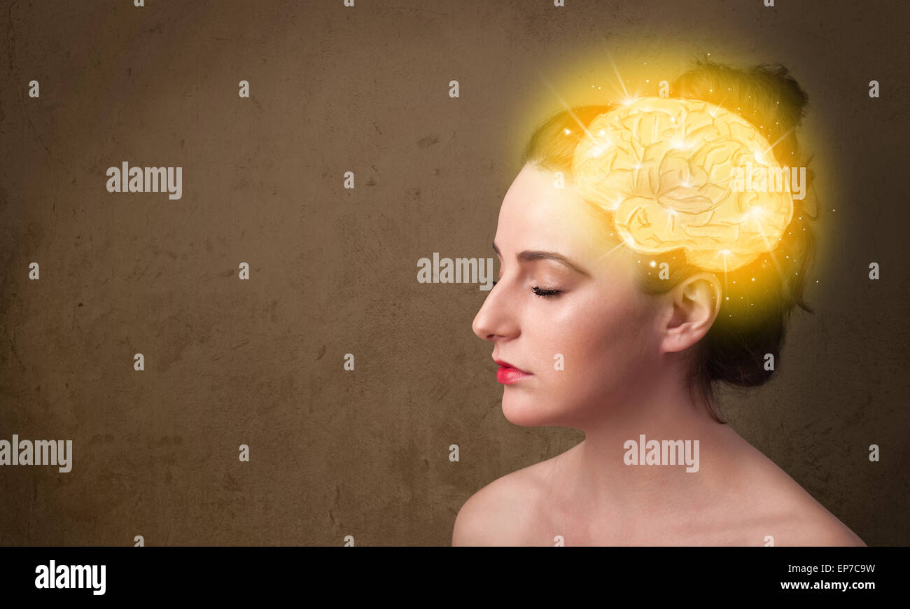 Young girl thinking with glowing brain illustration Stock Photo - Alamy