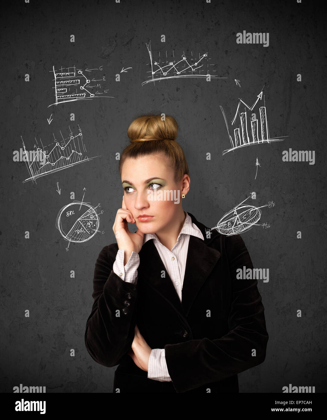 Young woman thinking with charts circulation around her head Stock ...