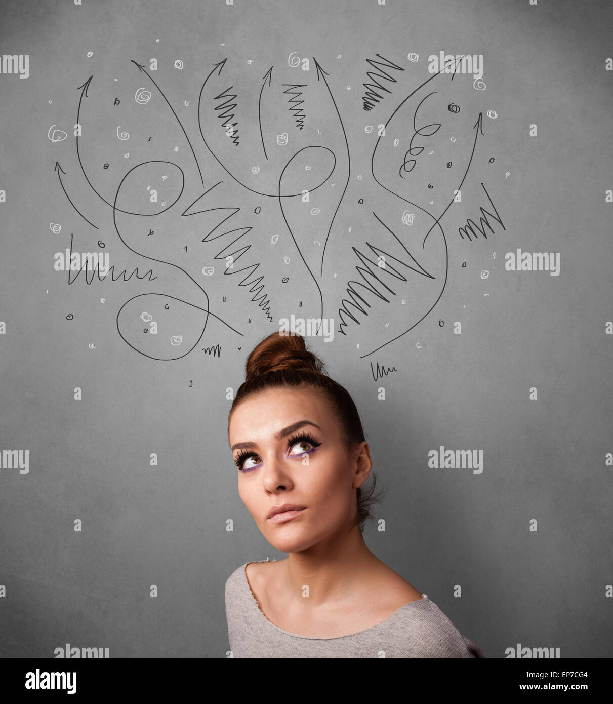 Young woman thinking with arrows over her head Stock Photo - Alamy