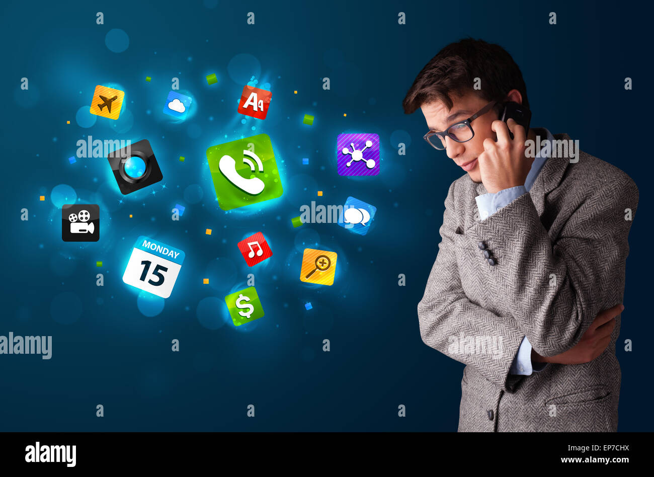 Young man calling by phone with various icons Stock Photo - Alamy