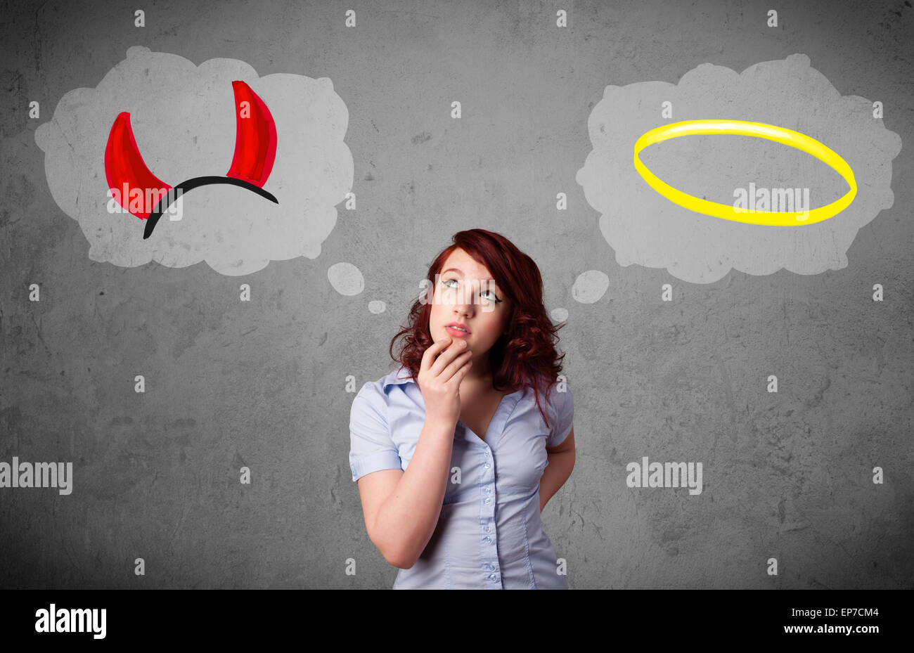 Woman choosing between good and bad Stock Photo - Alamy