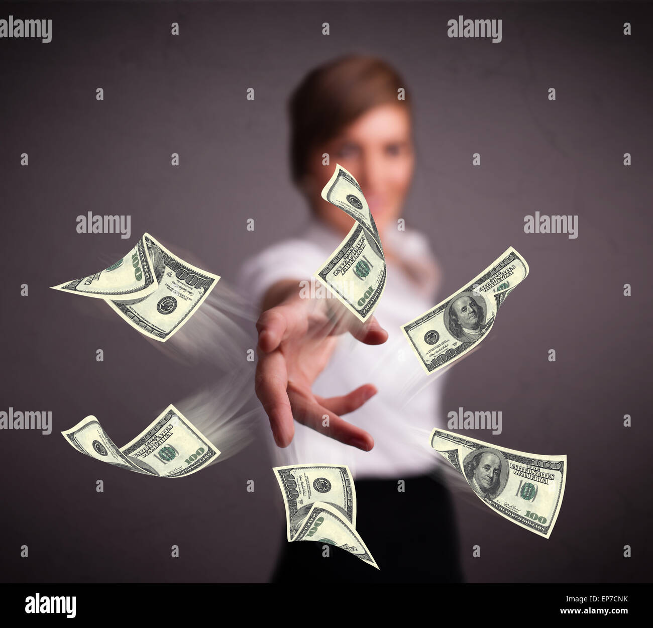 Young girl throwing money Stock Photo - Alamy