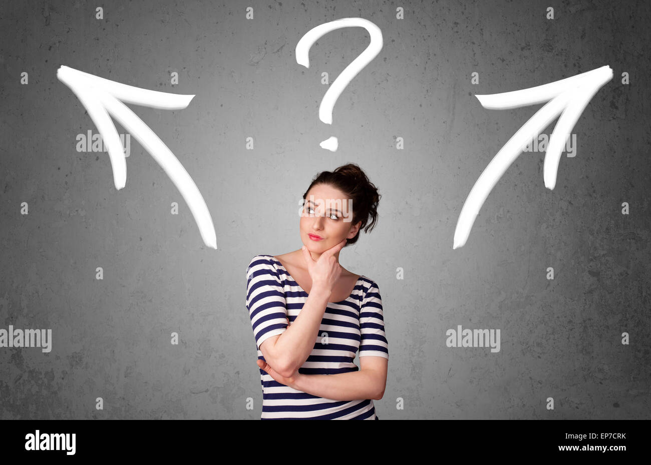 Young woman taking a decision Stock Photo - Alamy