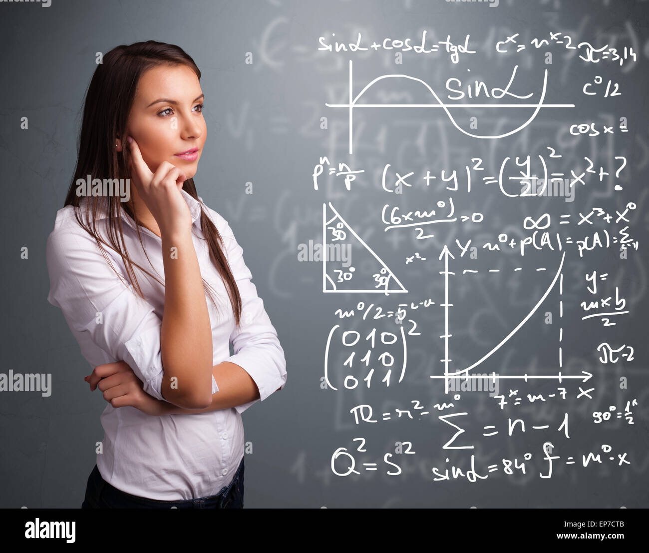 Beautiful school girl thinking about complex mathematical signs Stock ...
