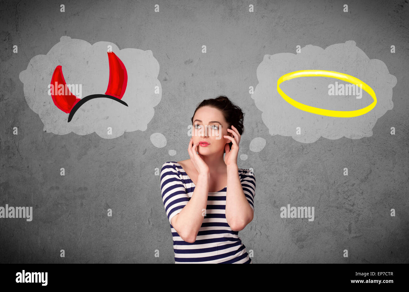 Woman choosing between good and bad Stock Photo - Alamy