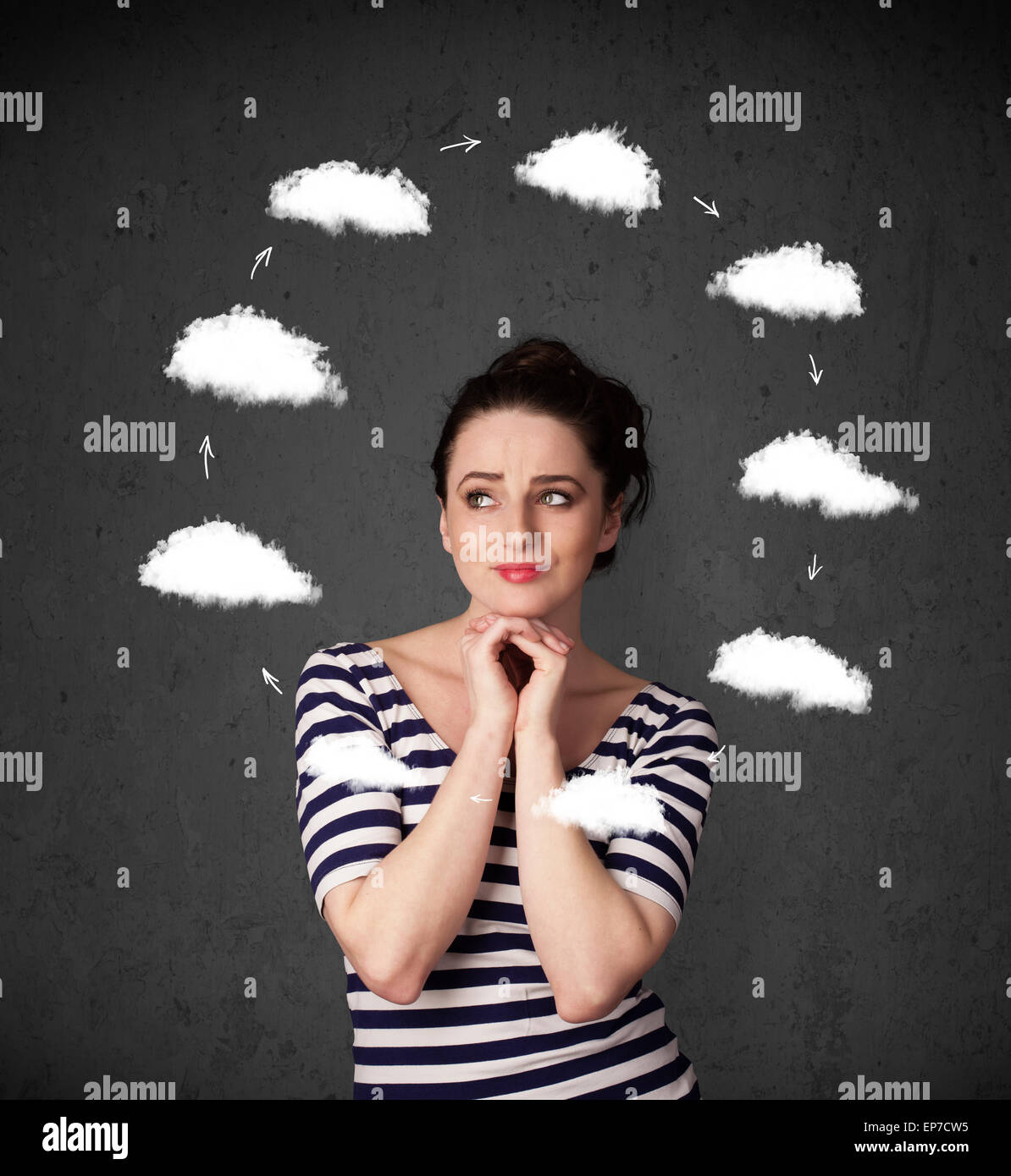 Young woman thinking with cloud circulation around her head Stock Photo ...