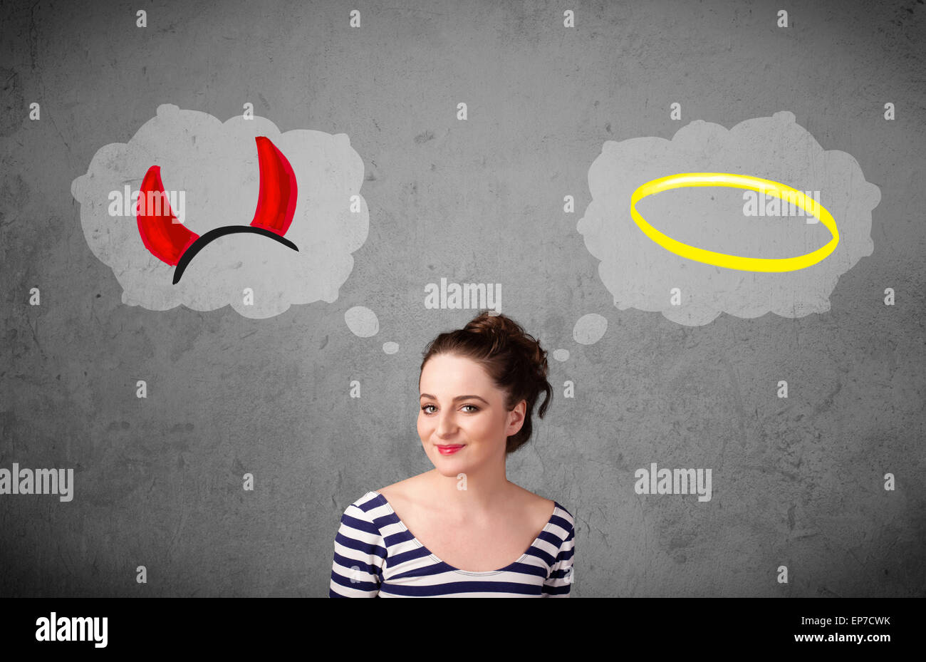 Woman choosing between good and bad Stock Photo - Alamy