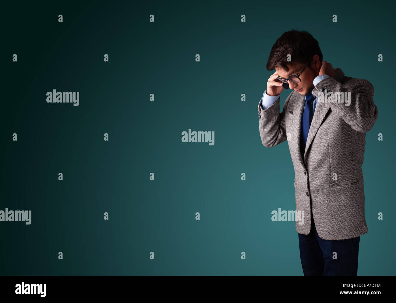 Young man making phone call with copy space Stock Photo - Alamy