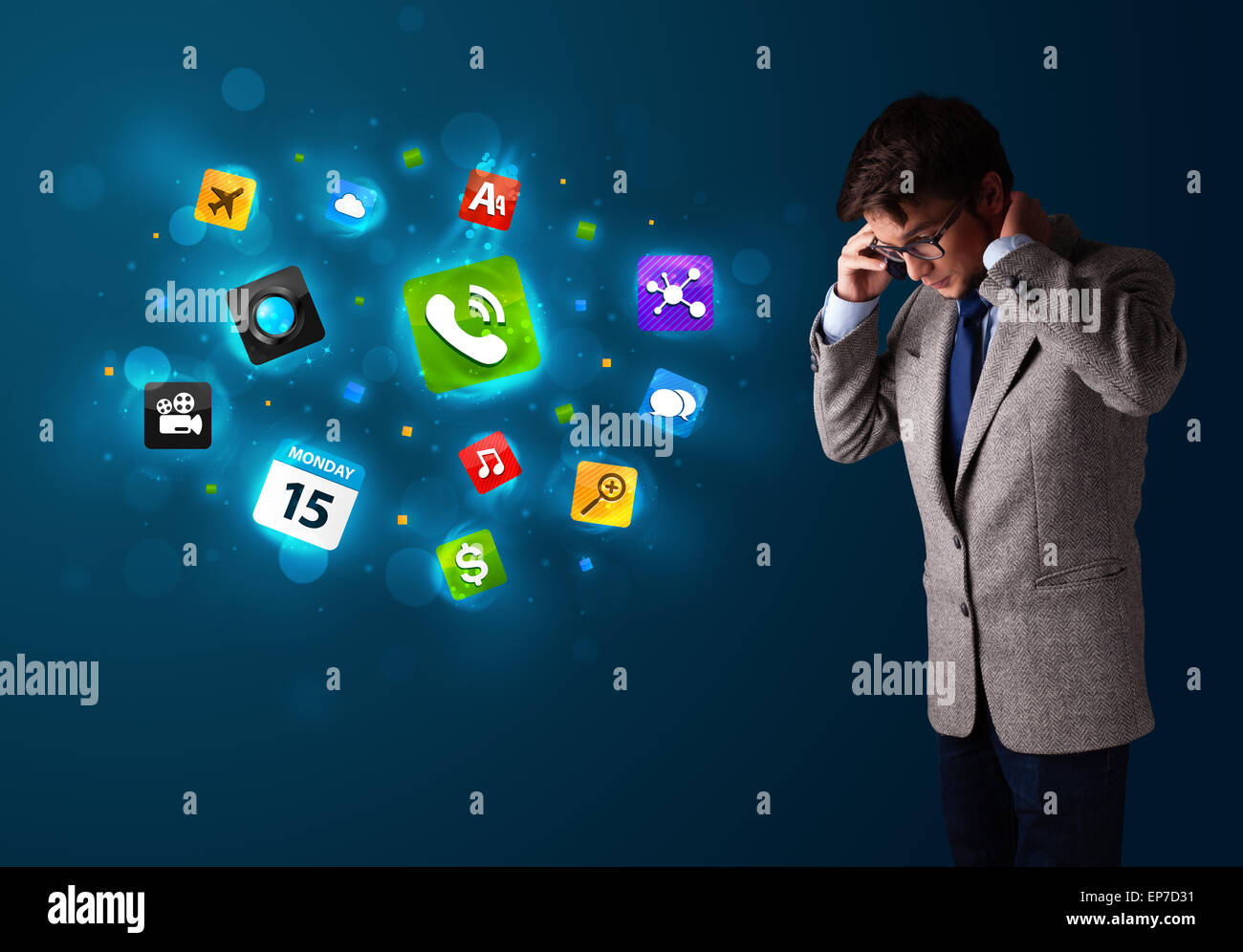 Young man calling by phone with various icons Stock Photo - Alamy