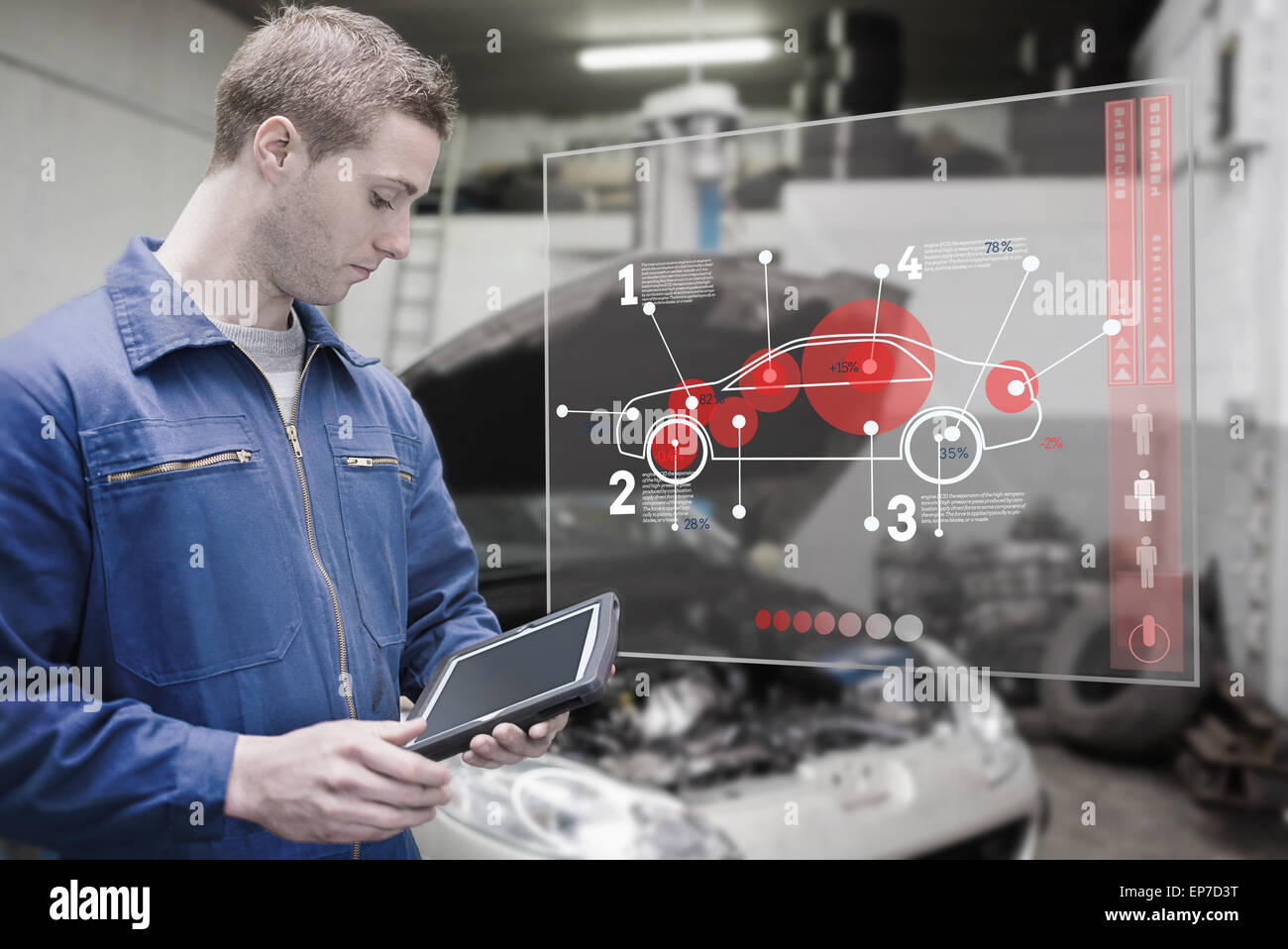 Mechanic using tablet and futuristic interface Stock Photo - Alamy