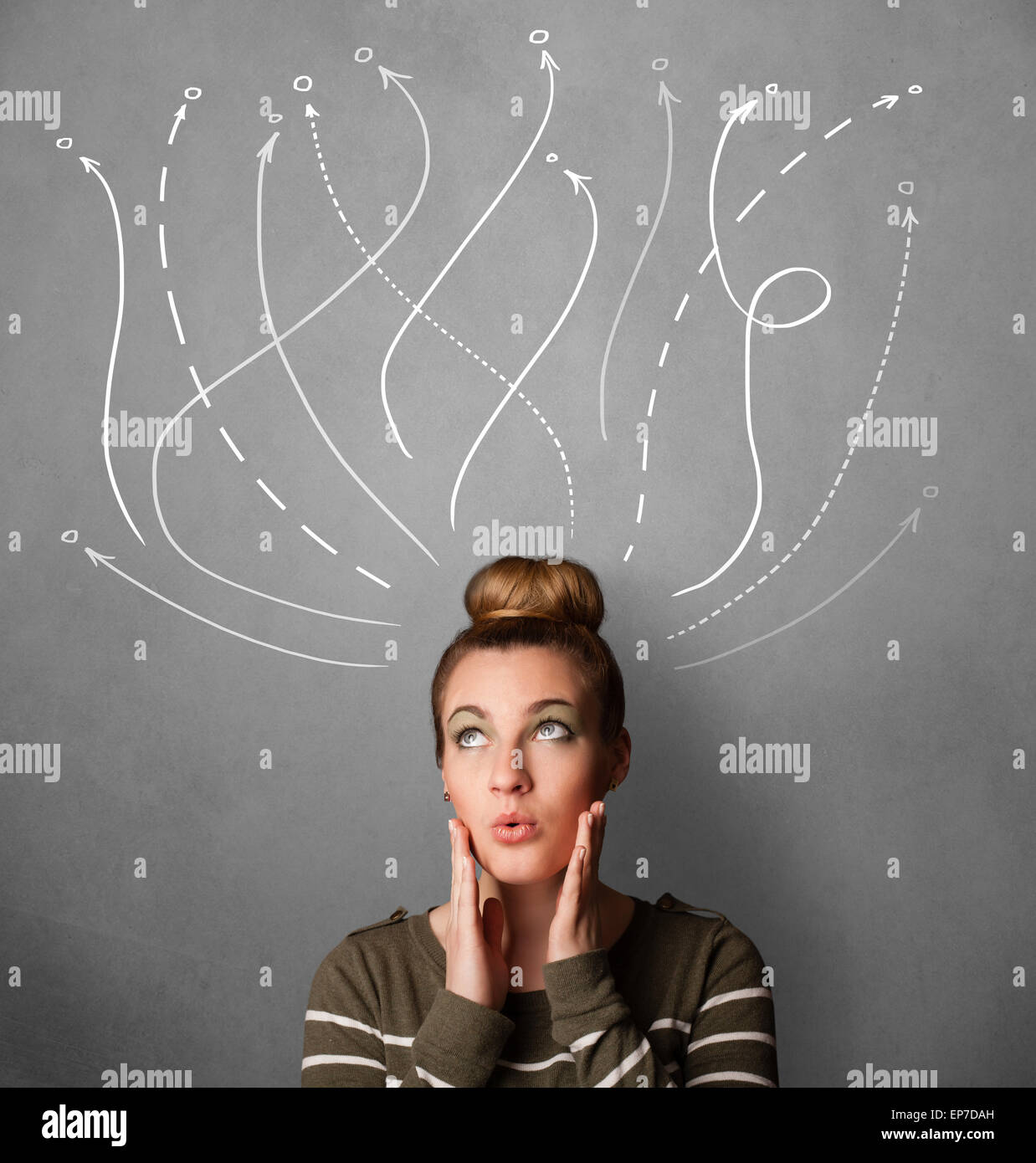 Young woman with arrows coming out of her head Stock Photo - Alamy