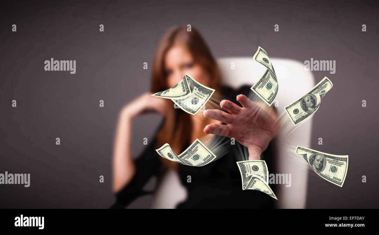 Young girl throwing money Stock Photo - Alamy